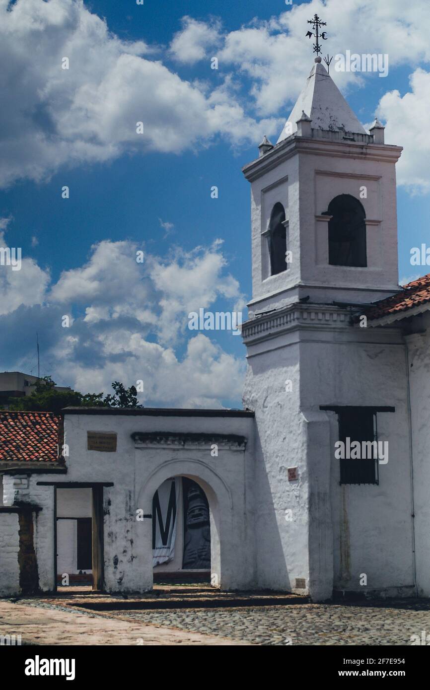 White clock tower of La Merced Church, next to Museo del Arte Religioso ...