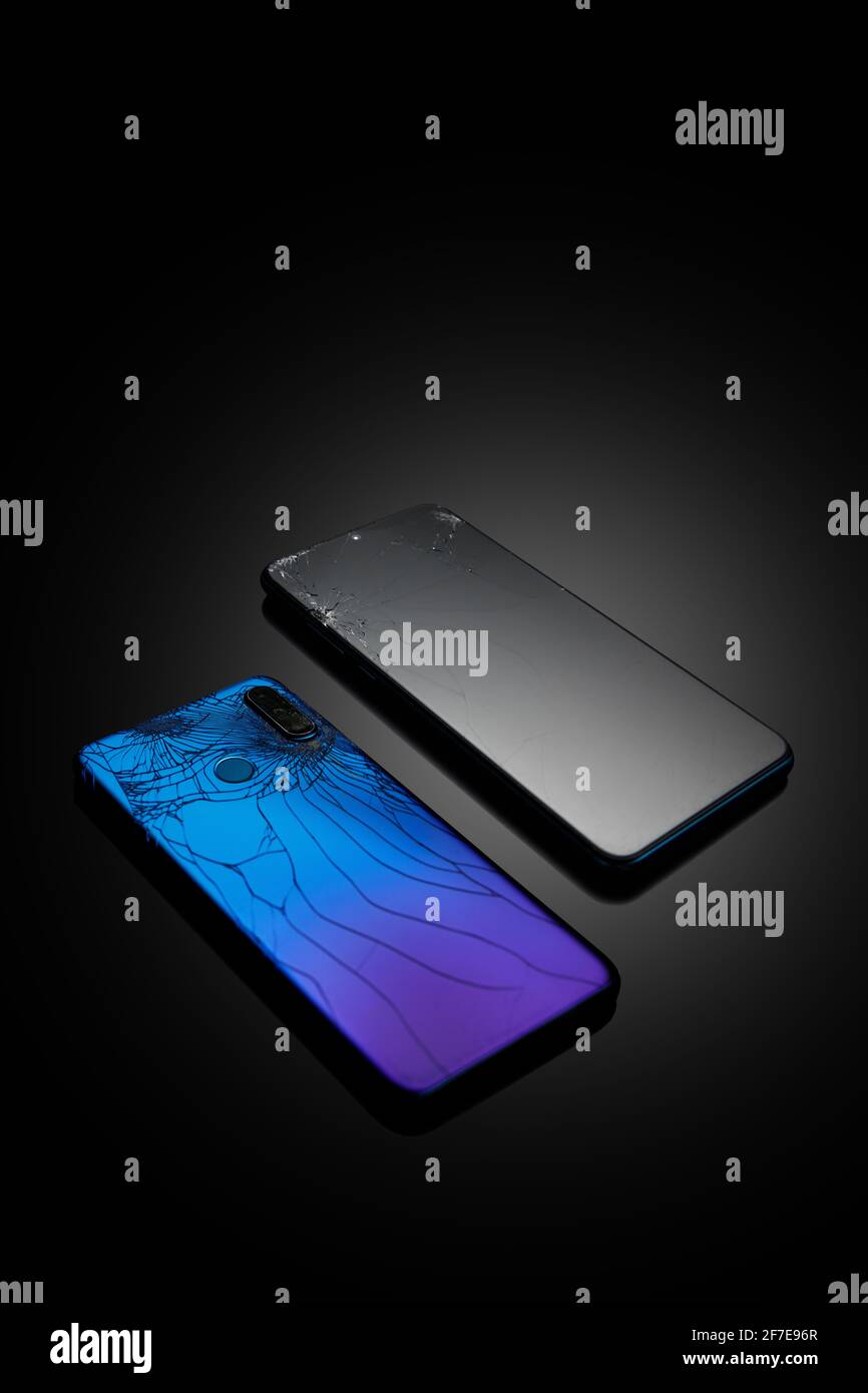 All side broken smartphone. Damaged glass on the two sides Stock Photo ...