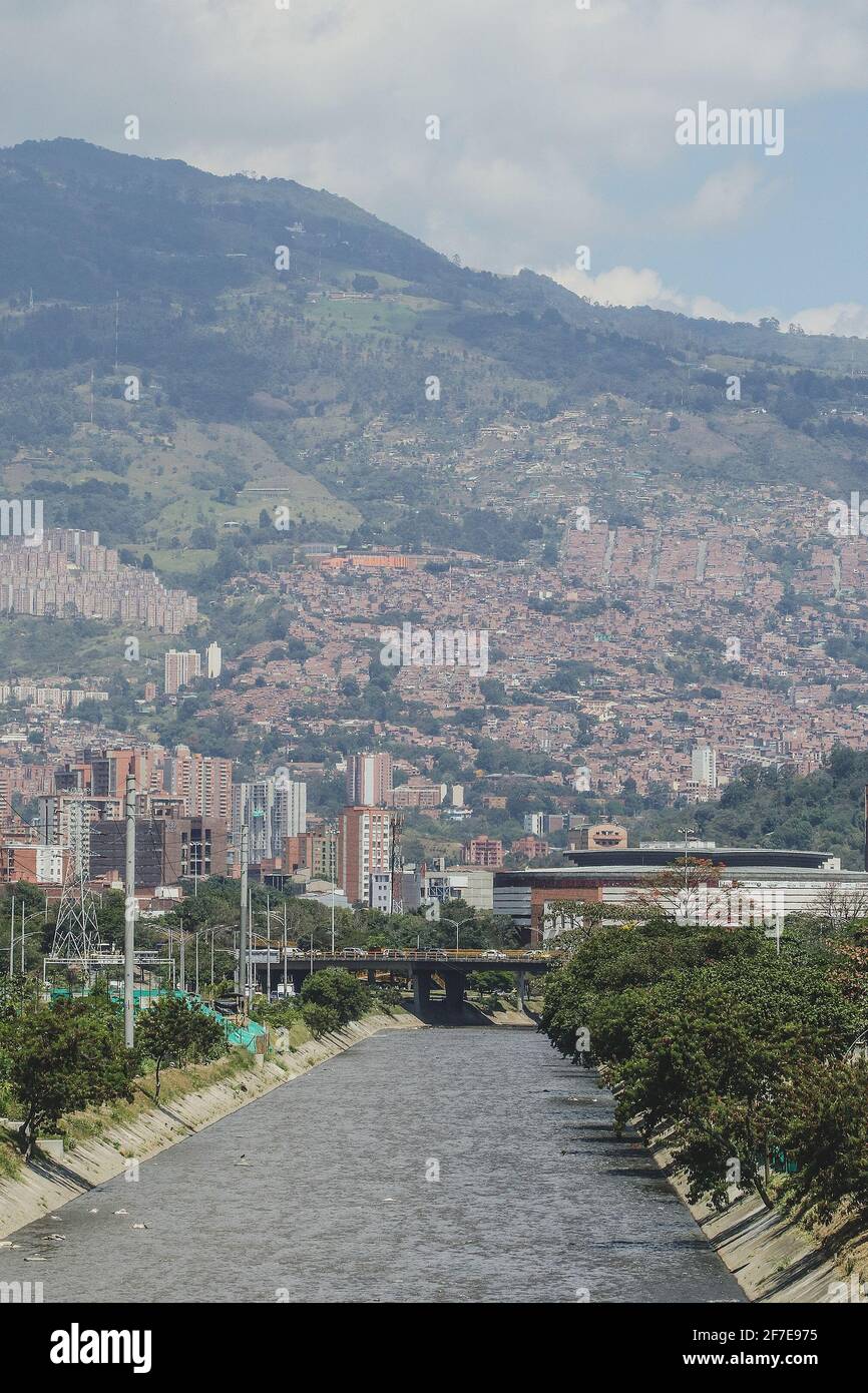 View of the river in Medellin, colombia on a sunny day. Visible a large ...