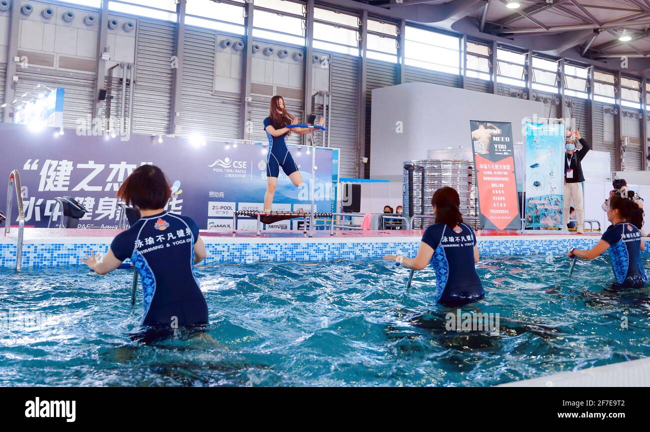 SHANGHAI, CHINA - APRIL 6, 2021 - Fitness experts exercise on a ...