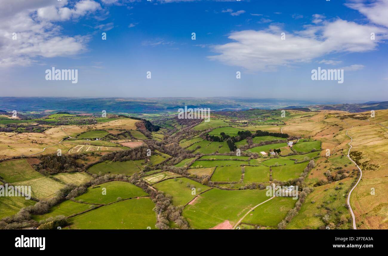 Aerial view of rural farmland and hills in Wales (Hay Bluff on the ...