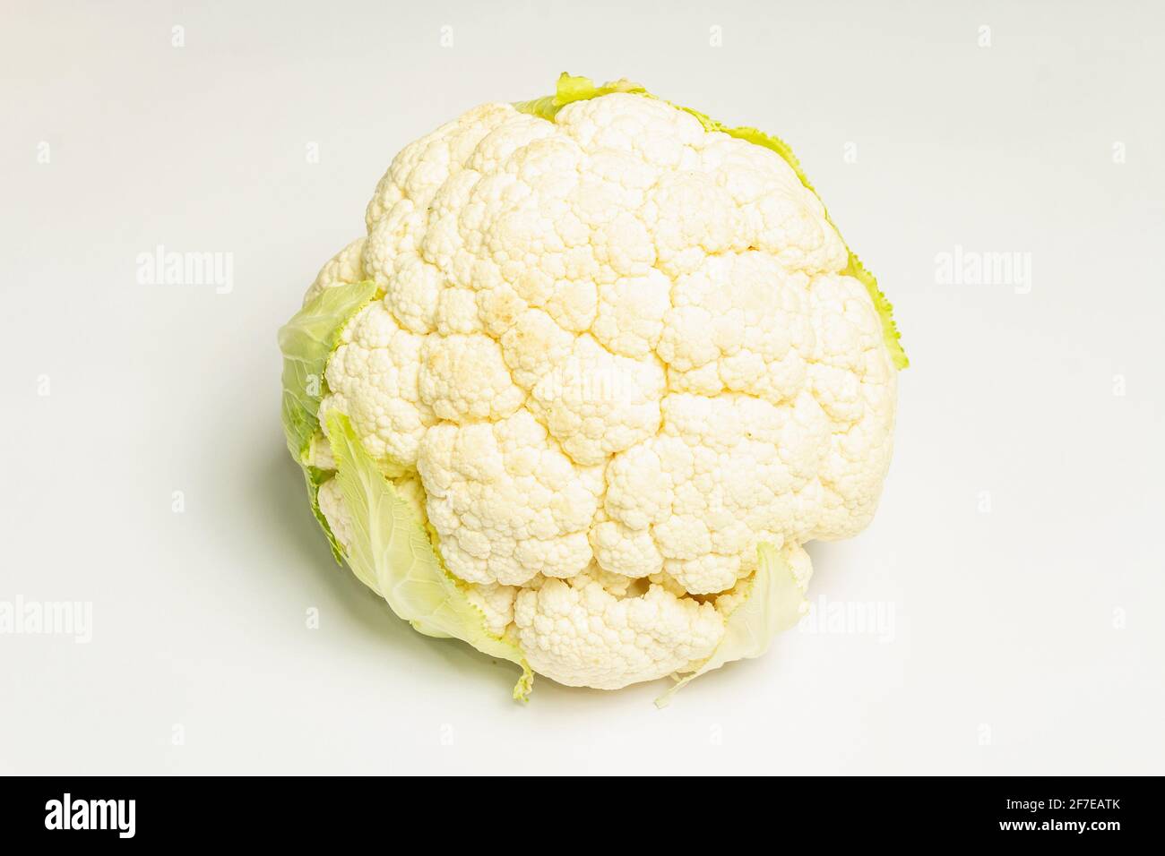 A fresh head of cauliflower isolated on white background. Raw single ...