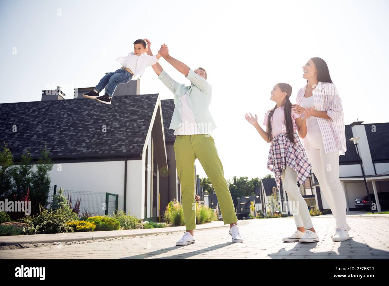 Full size portrait of cheerful big family playing toothy smile spend ...