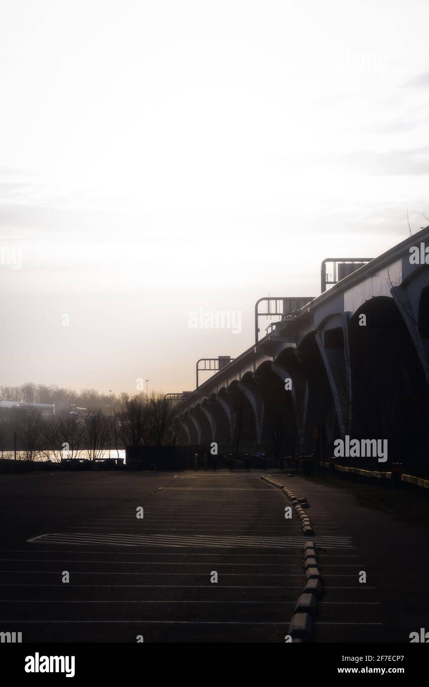 An empty parking lot underneath the Woodrow Wilson Bridge leading from ...