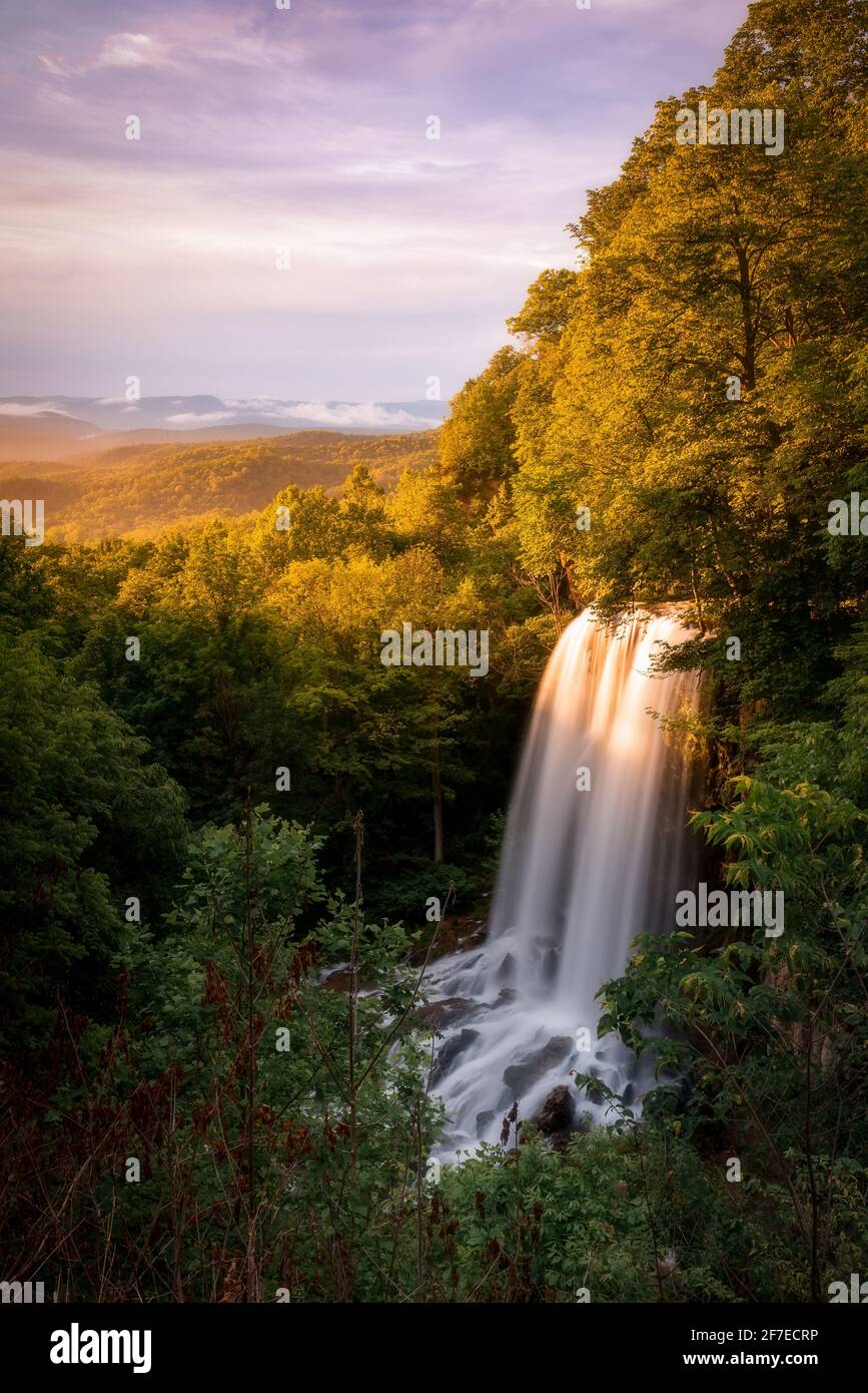 Evening Spring light shining on Falling Spring Falls in Covington ...