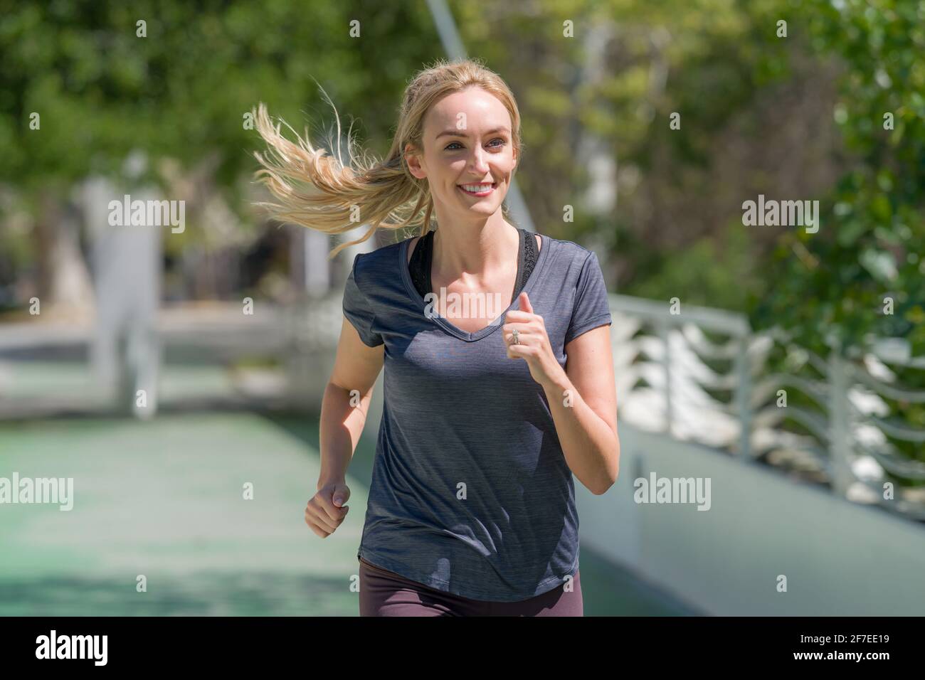 Fit athlete woman running hi-res stock photography and images - Alamy