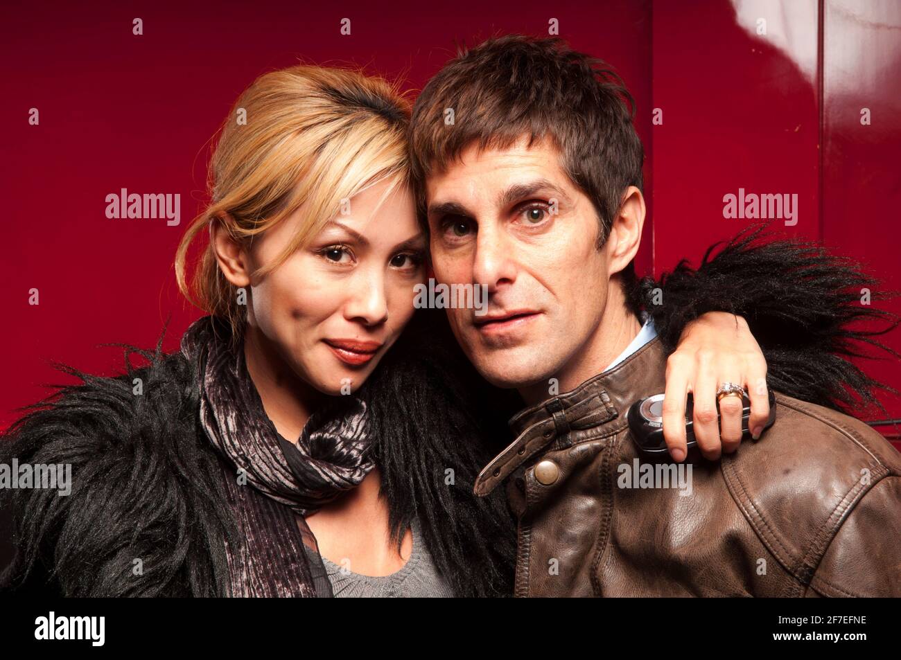 (L-R) Portrait of Etty Lau Farrell and singer Perry Farrell at club LAX ...