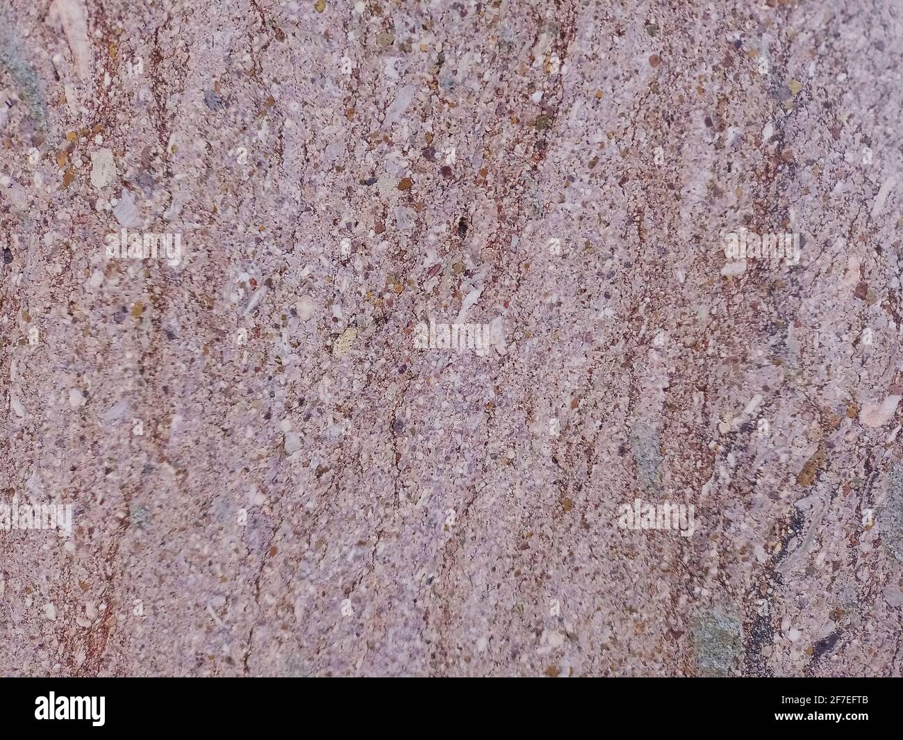 Texture of red stone with a crack. Red marble on the wall. Marble ...