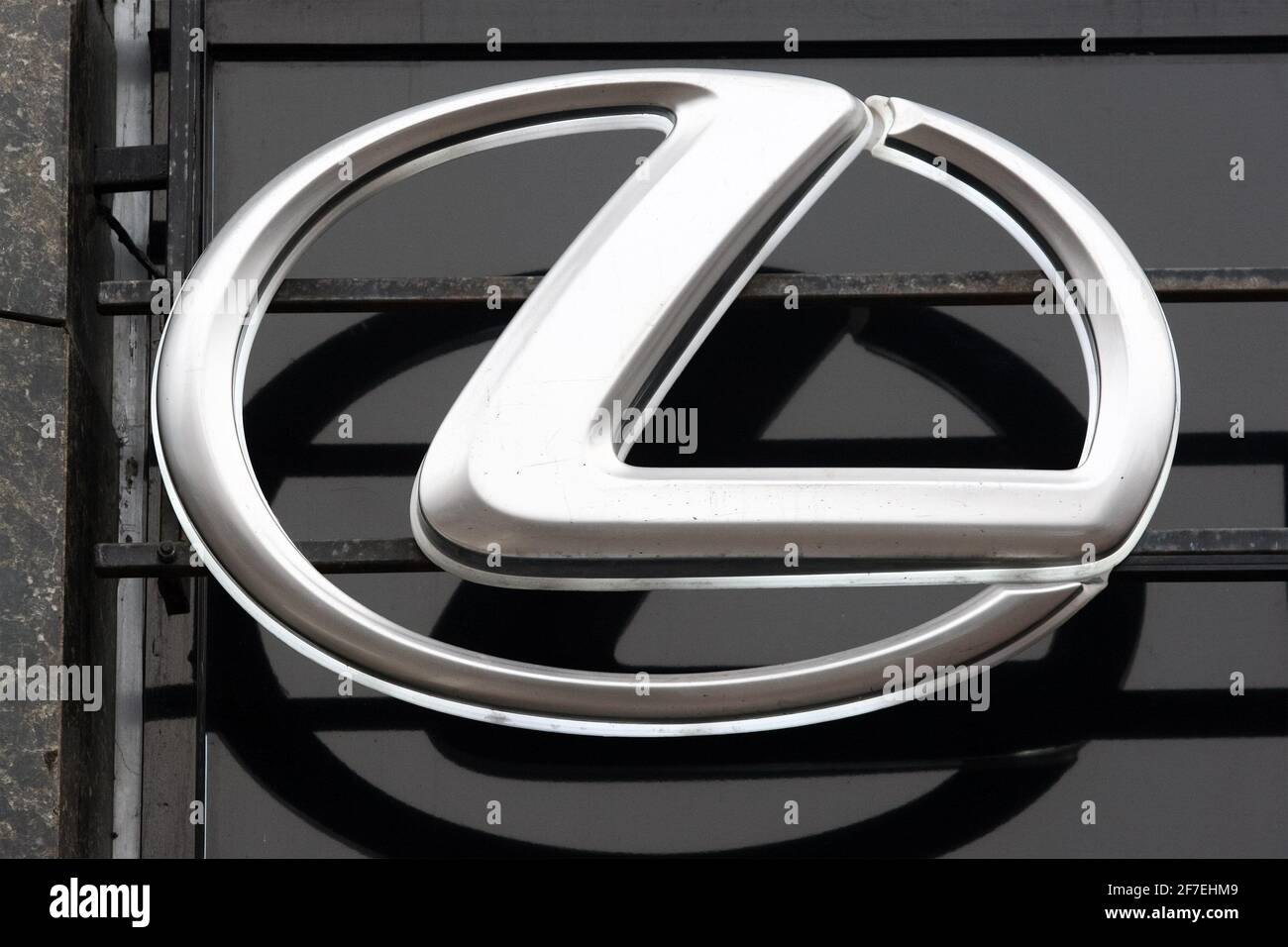Lexus logo is seen over the entrance to a car showroom in Kiev. (Photo ...