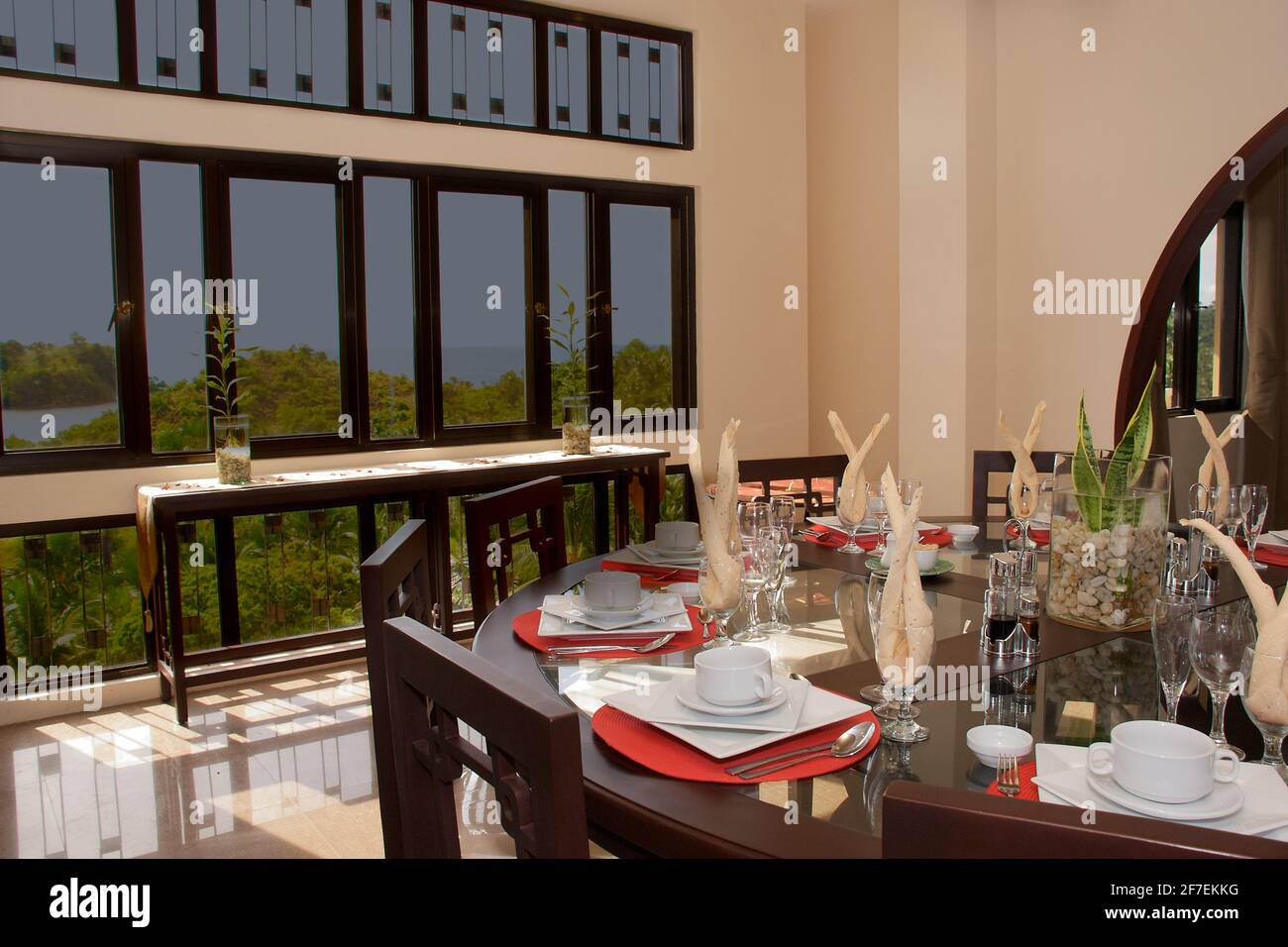 Dining room all set up with elegance for a meal. Interior shows a ...