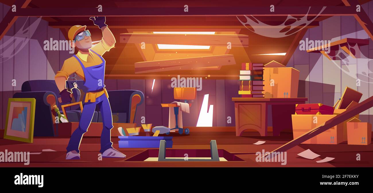 Worker repair old attic in house. Handyman with instruments fixing ...