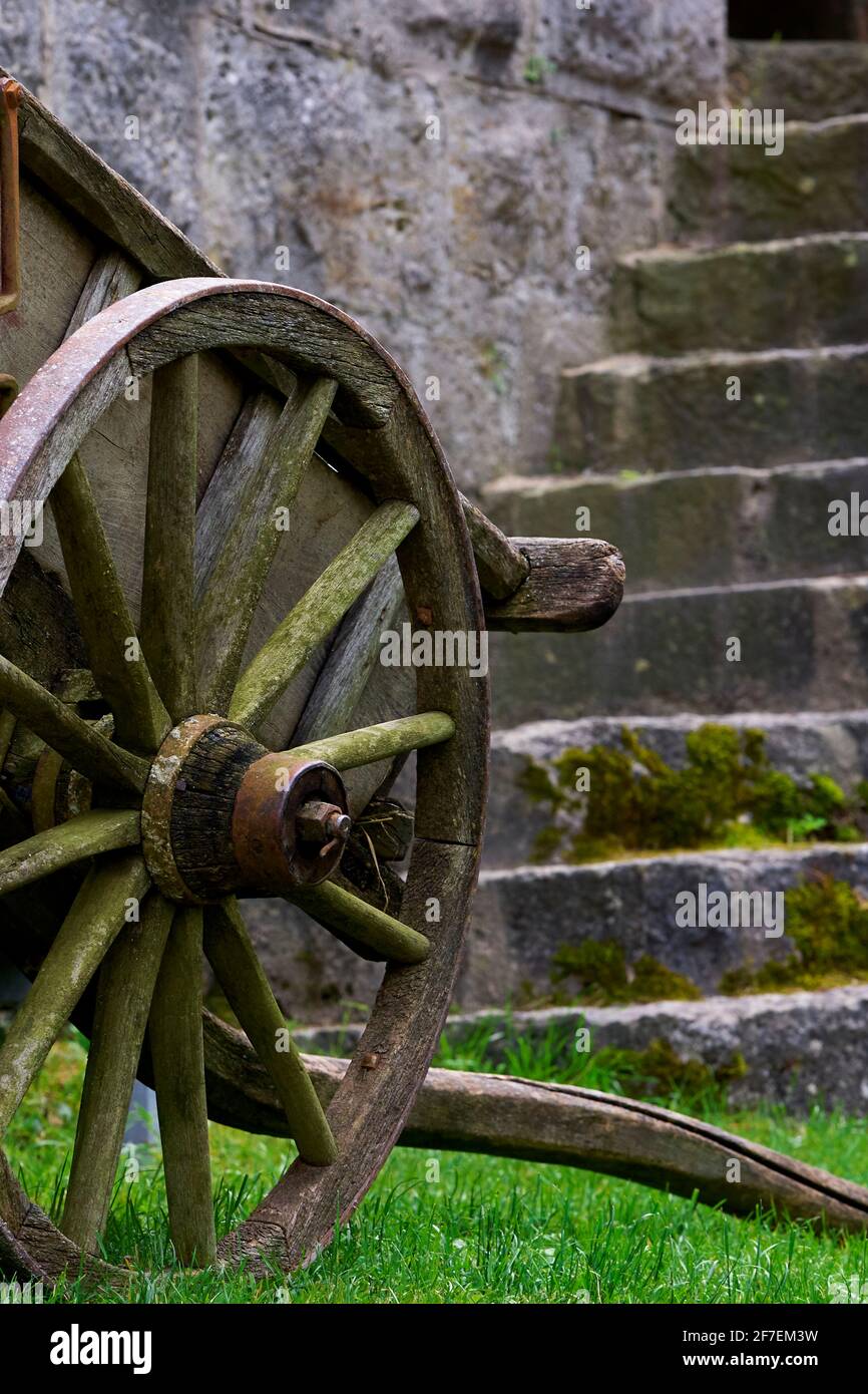 Medieval cart standing alone inside the walls of castle Burgruine ...