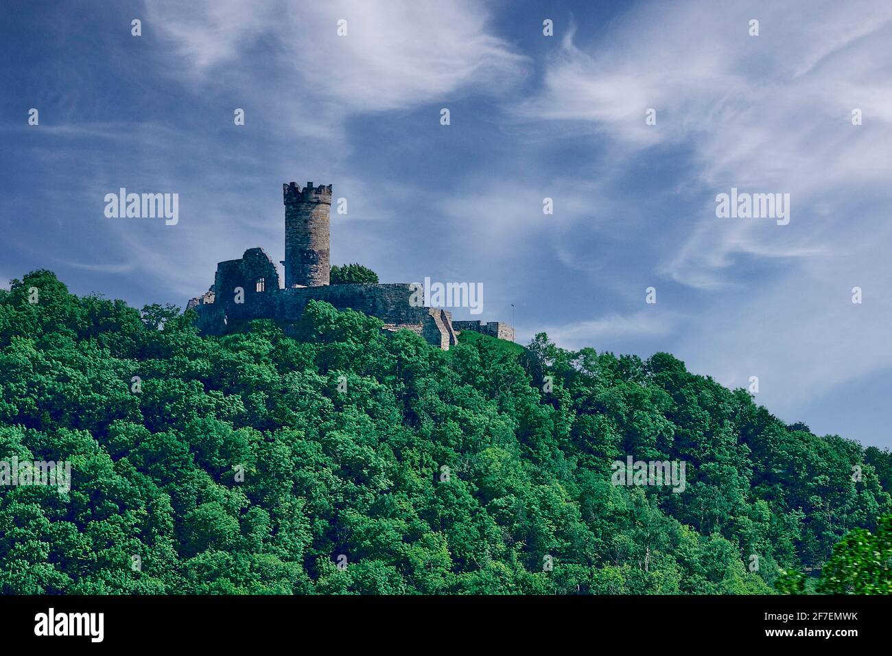 Medieval castle on hill on misty day. Old Muhlburg castle located ...