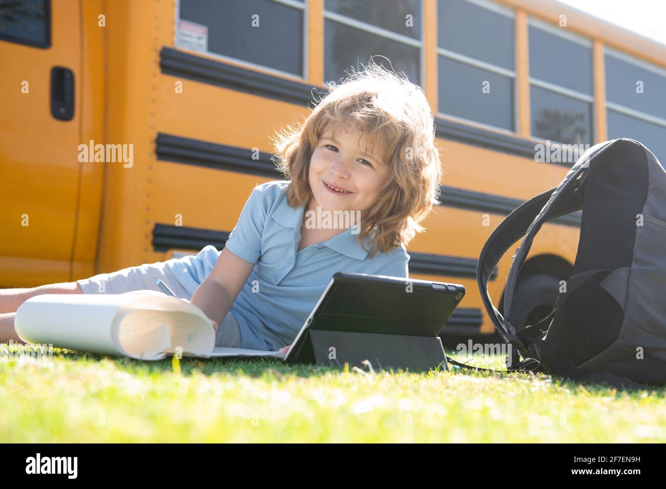 Child on school bus tablet hi-res stock photography and images - Alamy