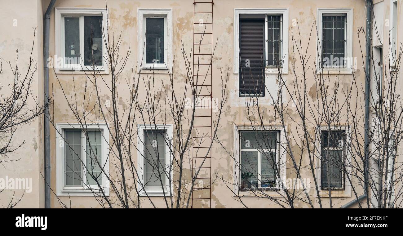 The facade of an old residential building Stock Photo - Alamy