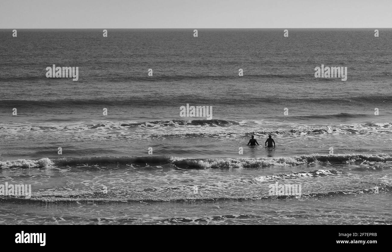 Woman wading in sea hi-res stock photography and images - Alamy