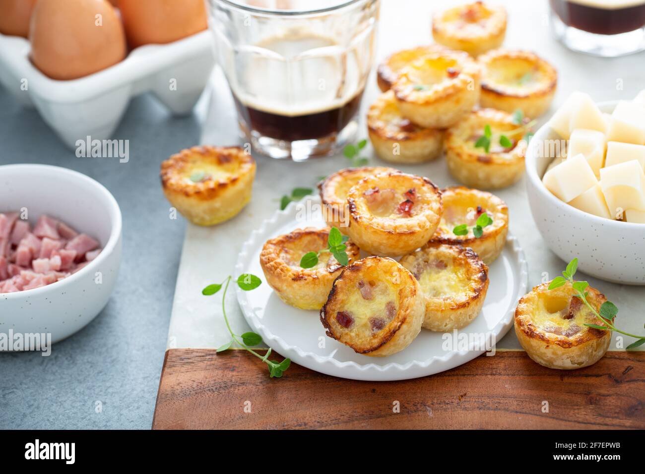 Mini ham and cheese quiches for breakfast Stock Photo - Alamy