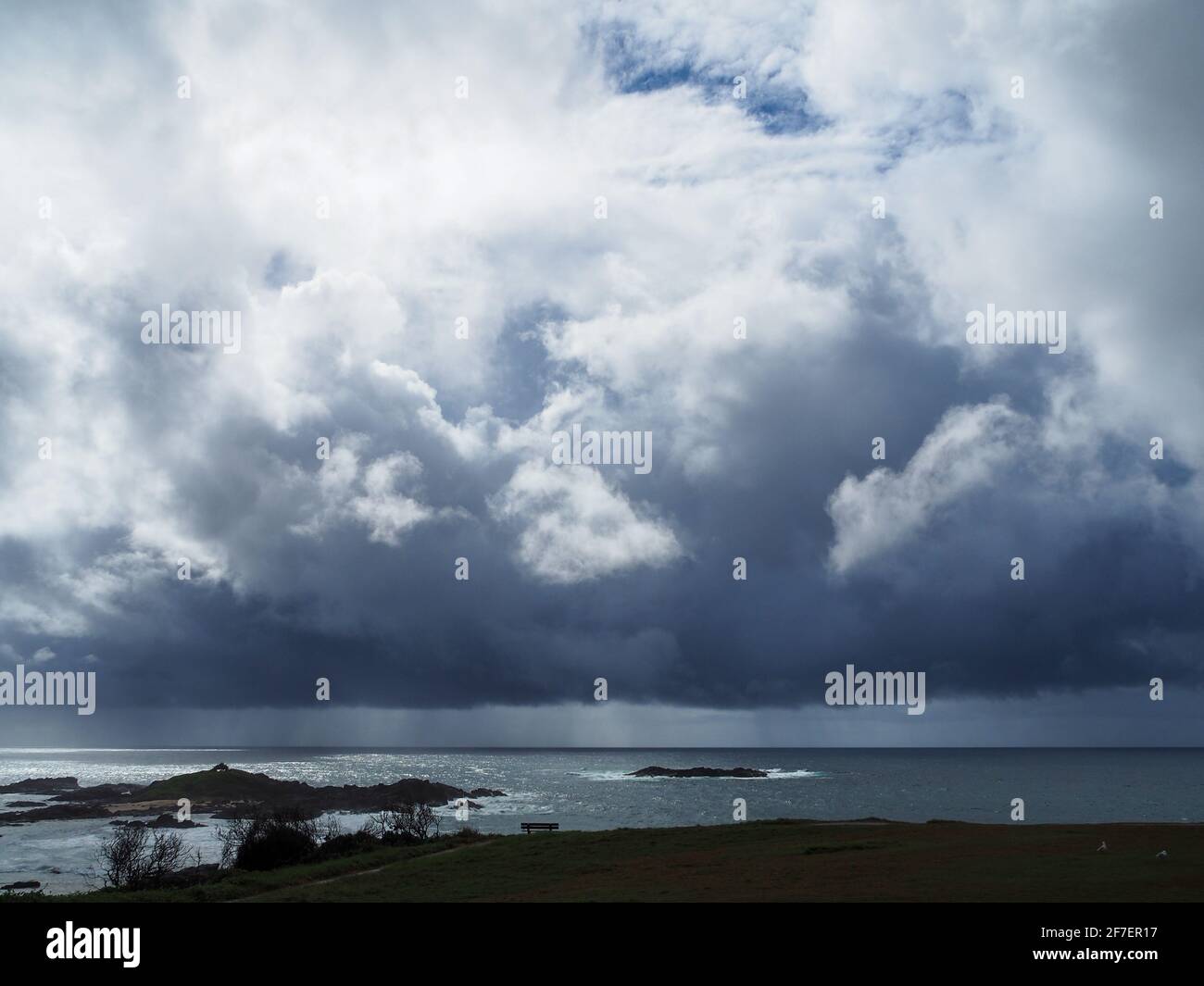 Storm at sea, View from headland of Dramatic grey clouds, hovering ...