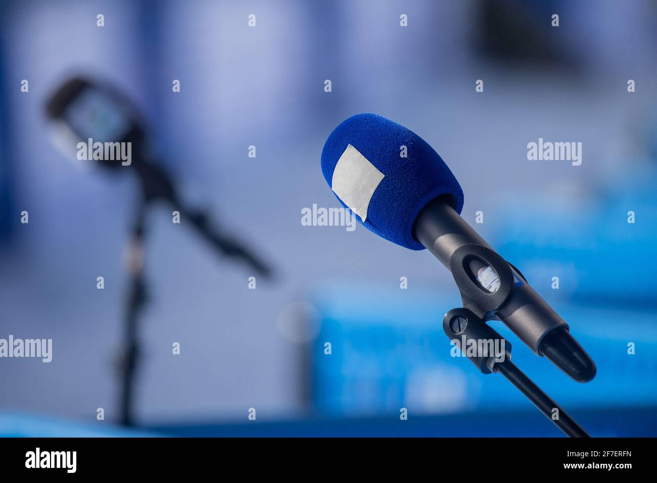 Professional wireless microphone on a microphone stand at a live event ...