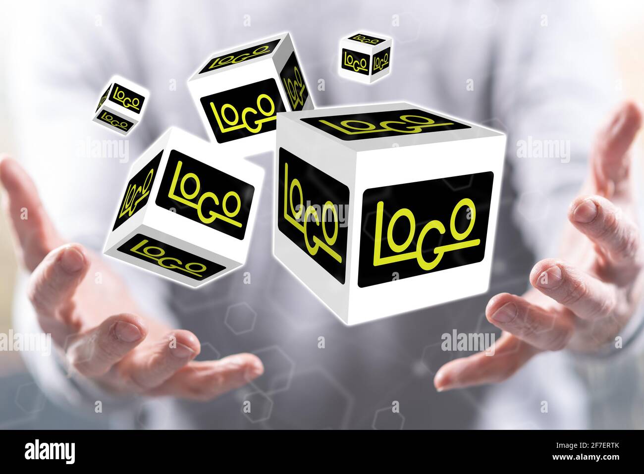 Brand concept above the hands of a man in background Stock Photo - Alamy