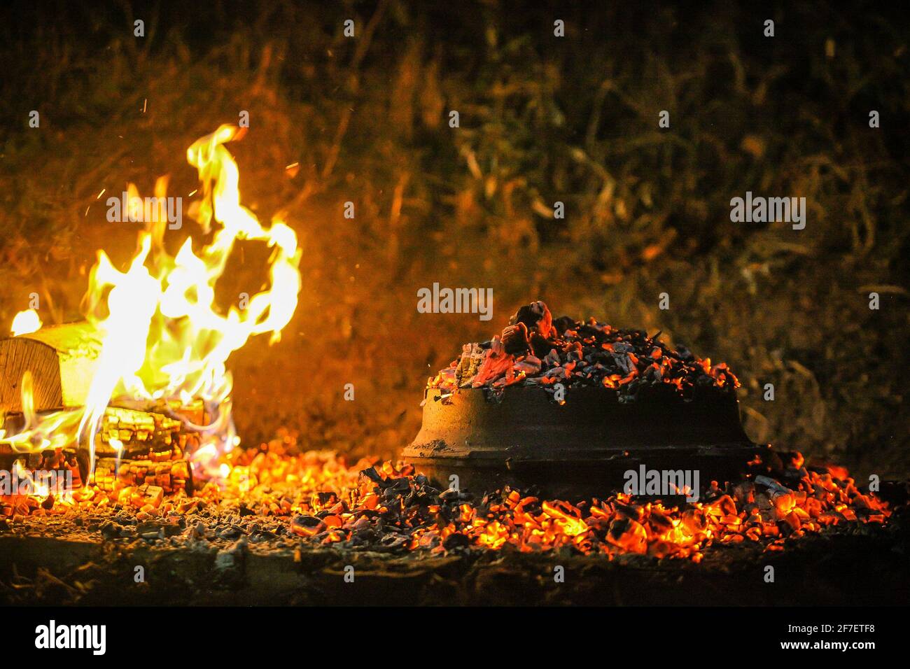 Cooking traditional balkan turkish bosnian dalmatian meal Peka in metal ...