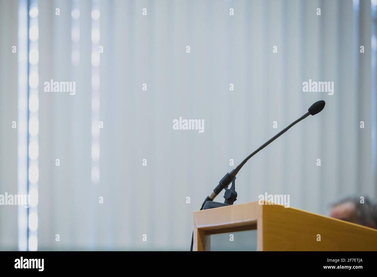 Single lecture microphone on a lecture stand at a conference hall Stock ...