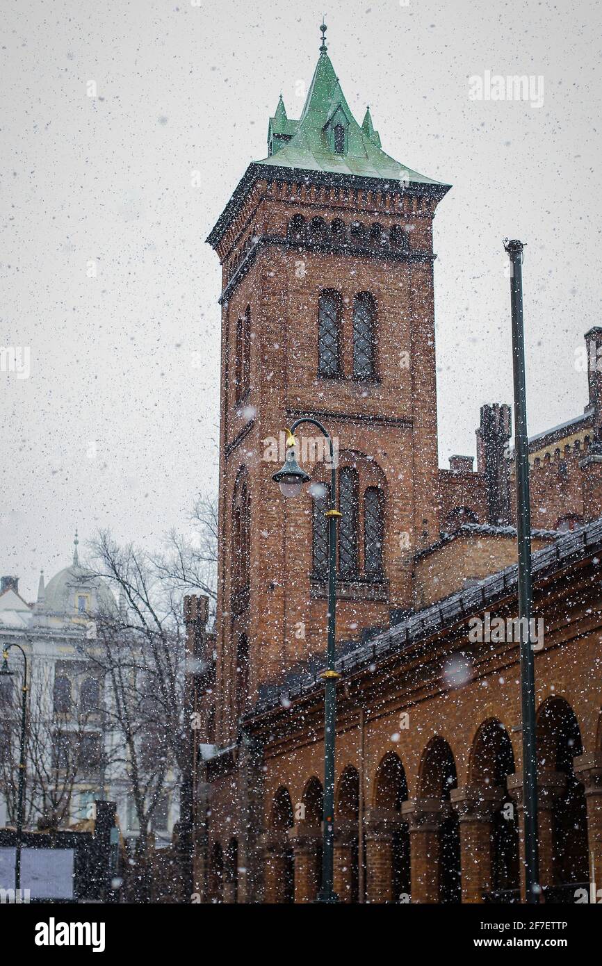 Arcades or old church and bazaar in Oslo during gray day with heavy ...