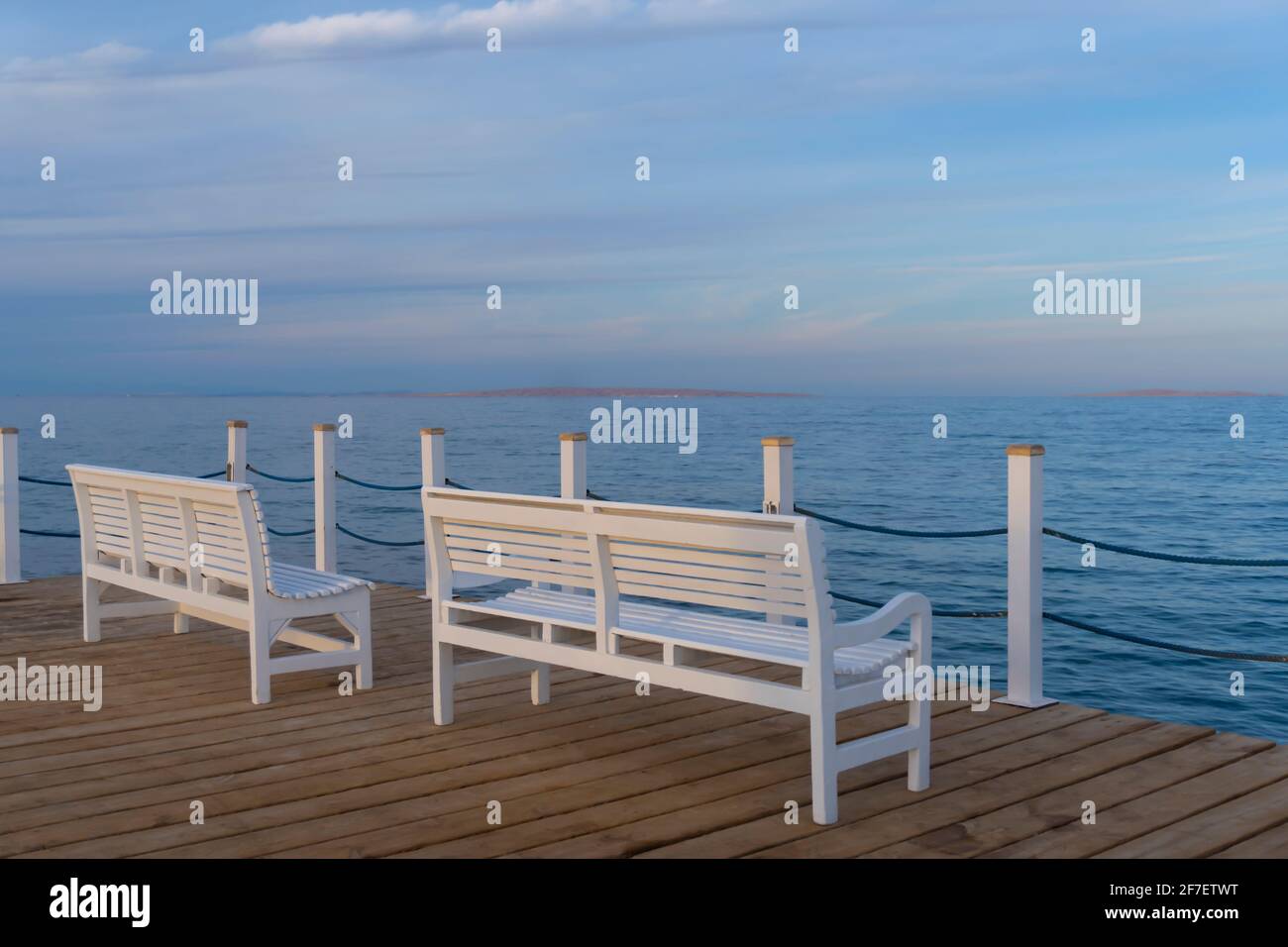 Back to back outdoor benches hi-res stock photography and images - Alamy