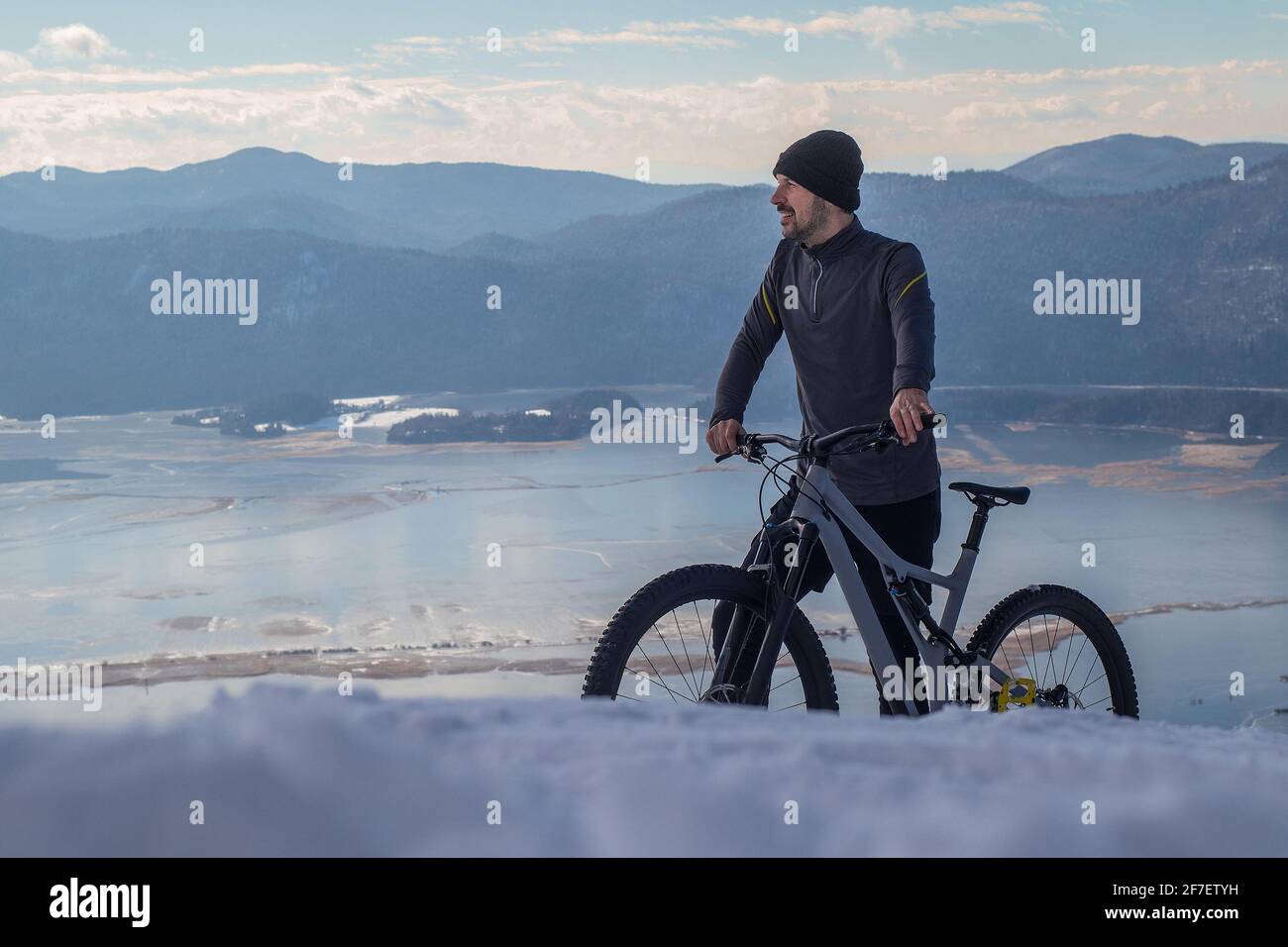 Male model posing in snow hi-res stock photography and images - Alamy