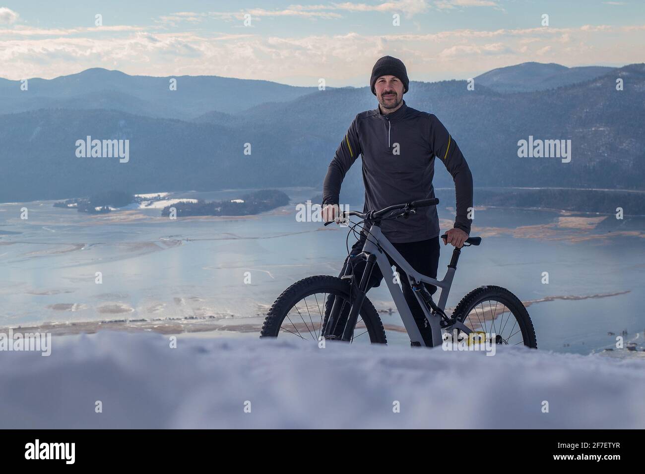 Male model posing in snow hi-res stock photography and images - Alamy