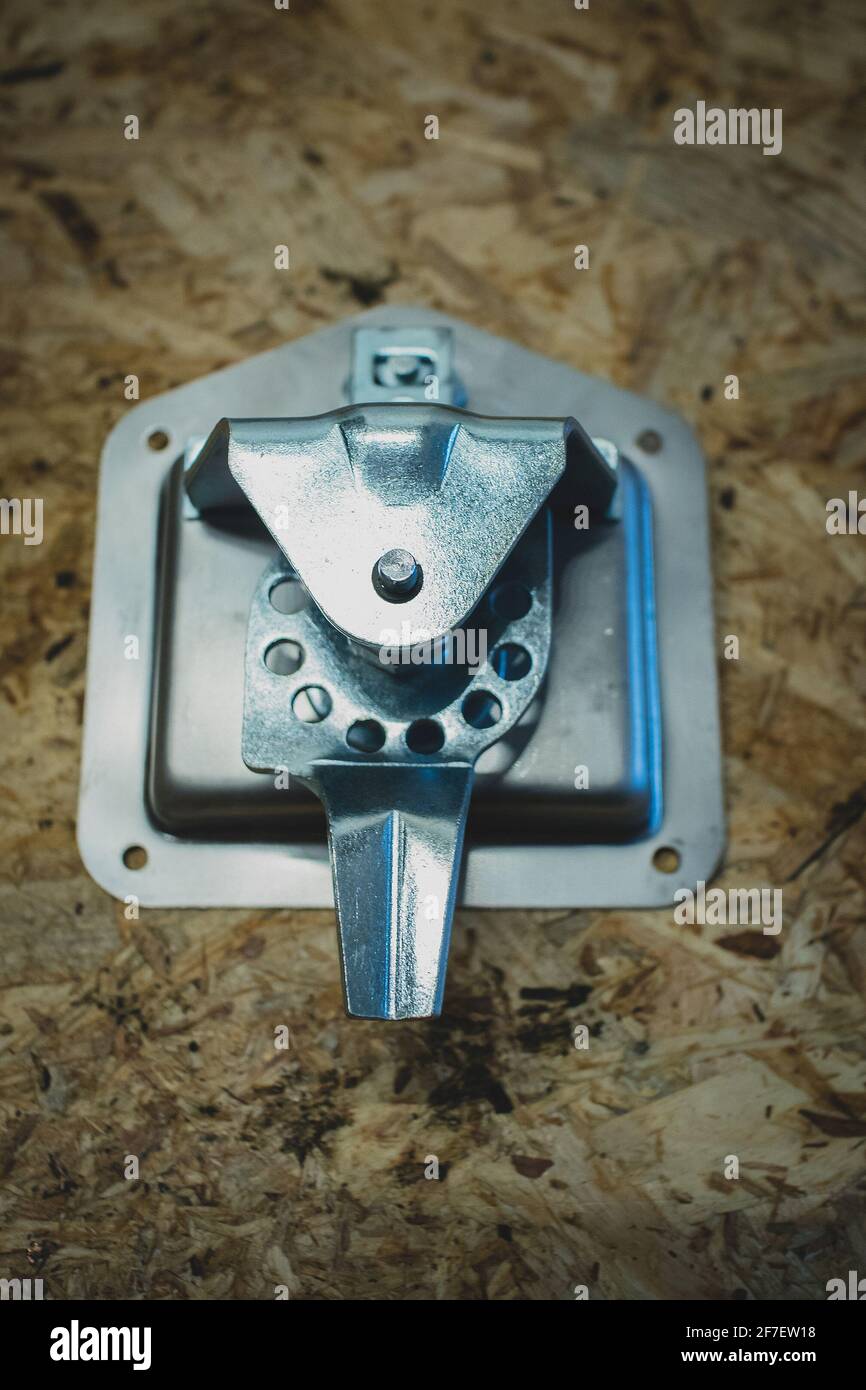 Rear view of single metal lock or latch ready to install into a door ...