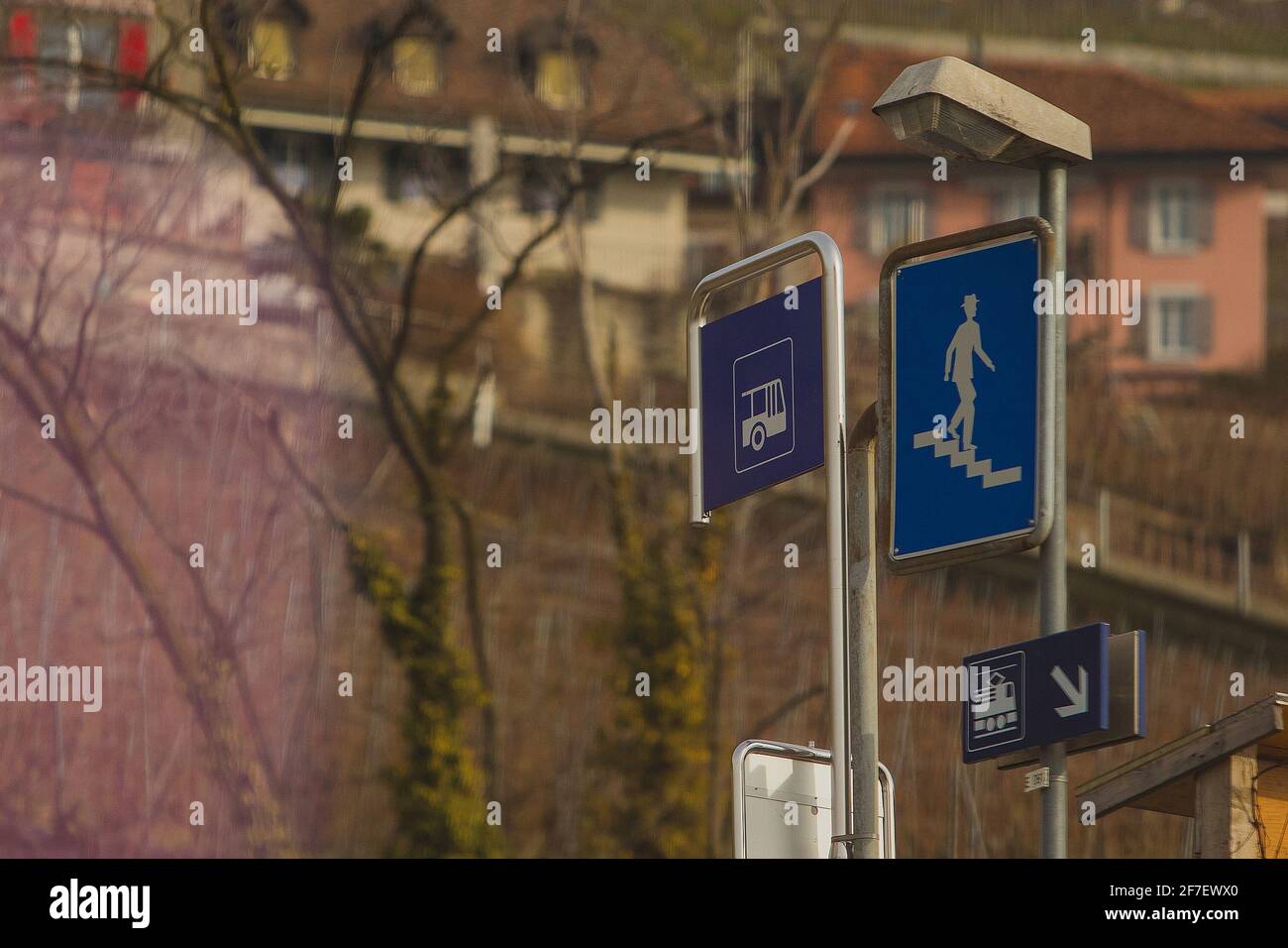 Signs for pedestrian underpass,a white pictogram on a blue board, next ...