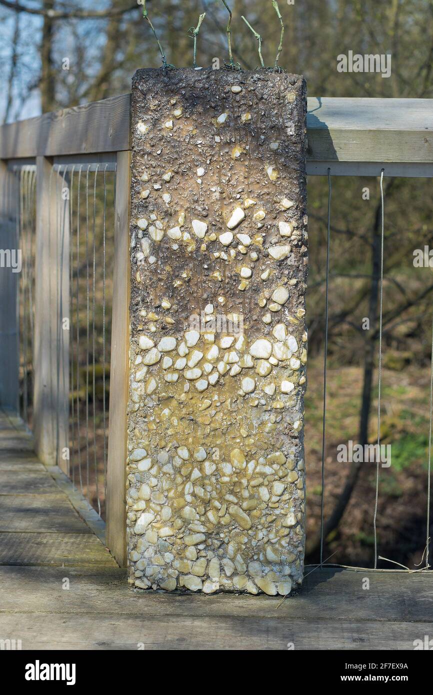 A display of different soil layers and stones inside. Ground layers on ...
