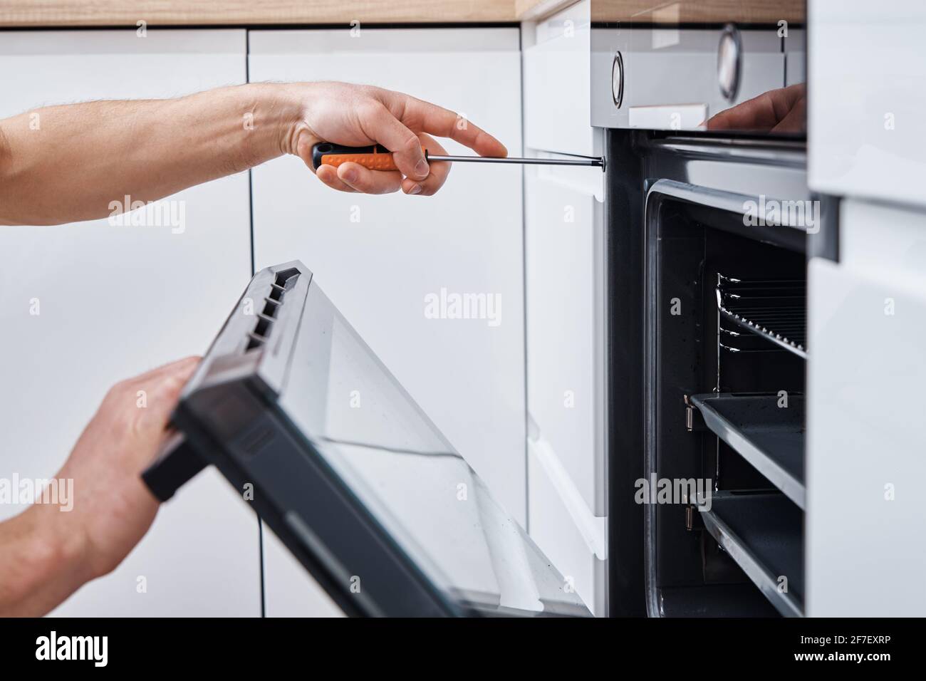 Appliance repair hi-res stock photography and images - Alamy