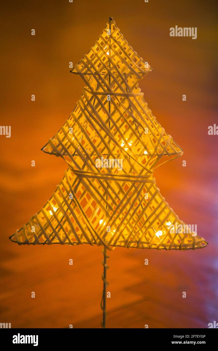 Small woven christmas tree from strands or straws with warm white led ...