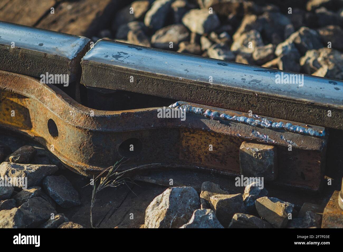 Detail of temporary fix of broken or cracked rail or railway track due ...