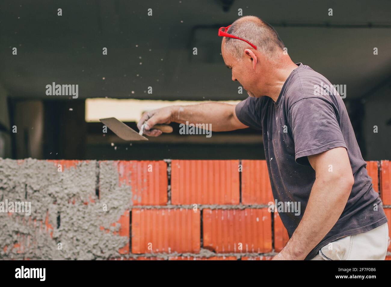 Throwing brick hi-res stock photography and images - Alamy