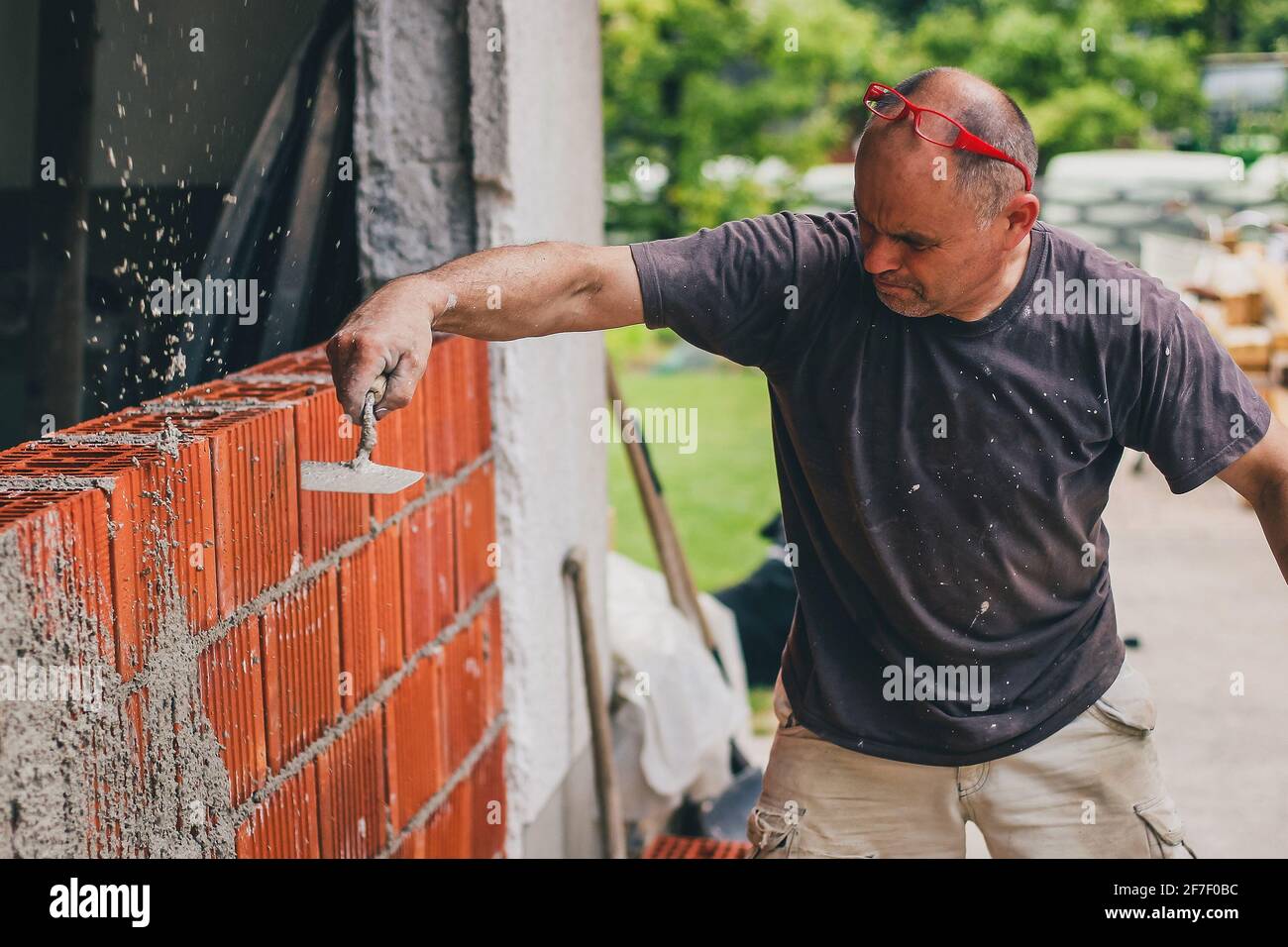 Throwing brick hi-res stock photography and images - Alamy