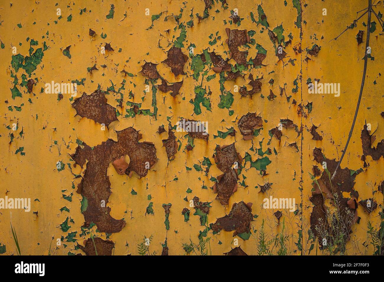 Chipped or cracked paint on rough old worn metal surface or panel ...