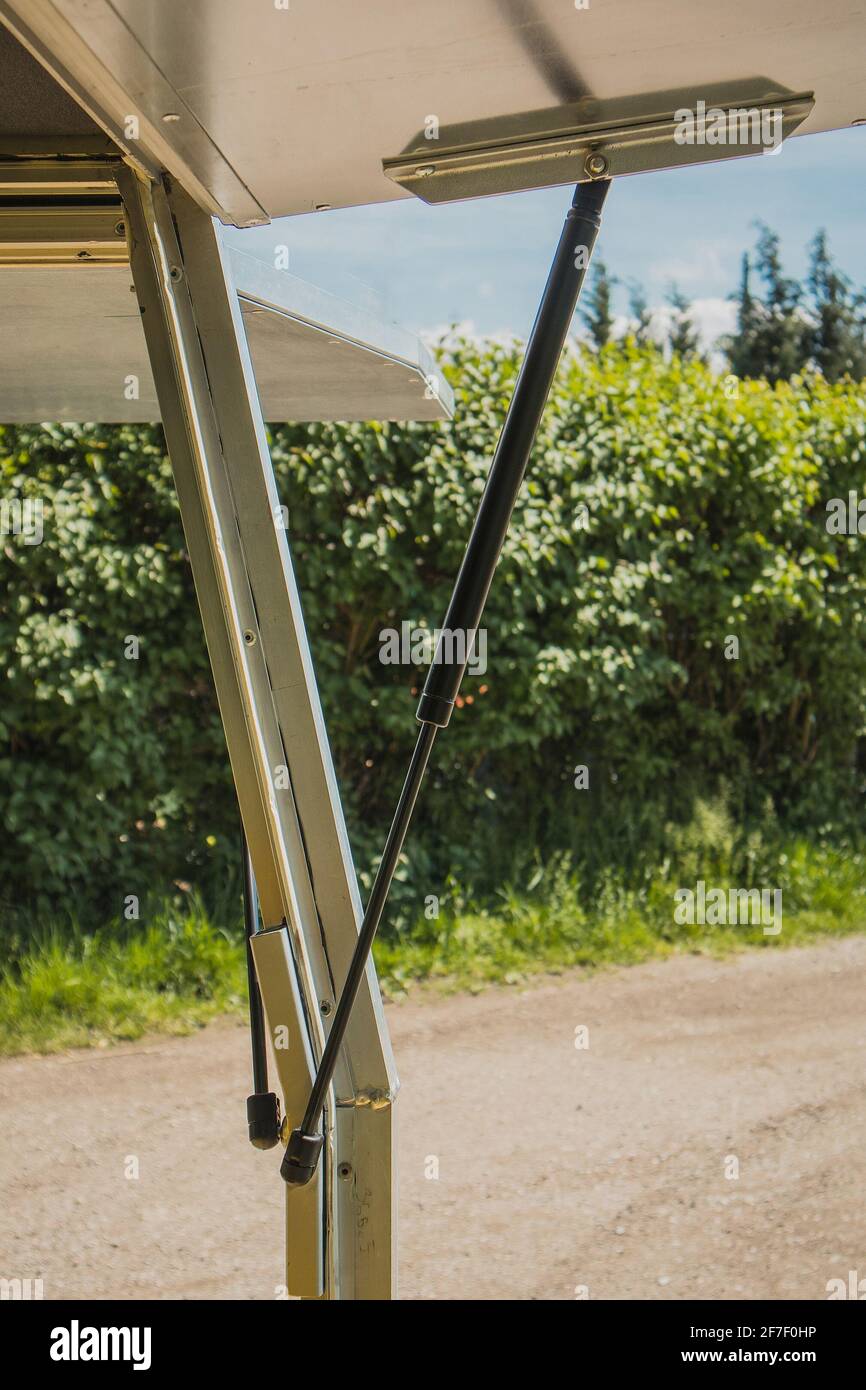 Gas filled pressure lifter or absorber, installed on an industrial ...