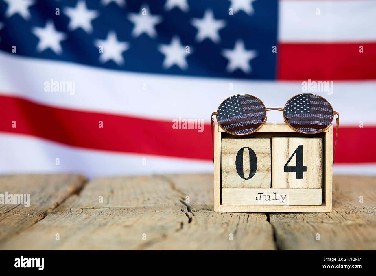 Wooden calendar with numbers on which the image of America's ...