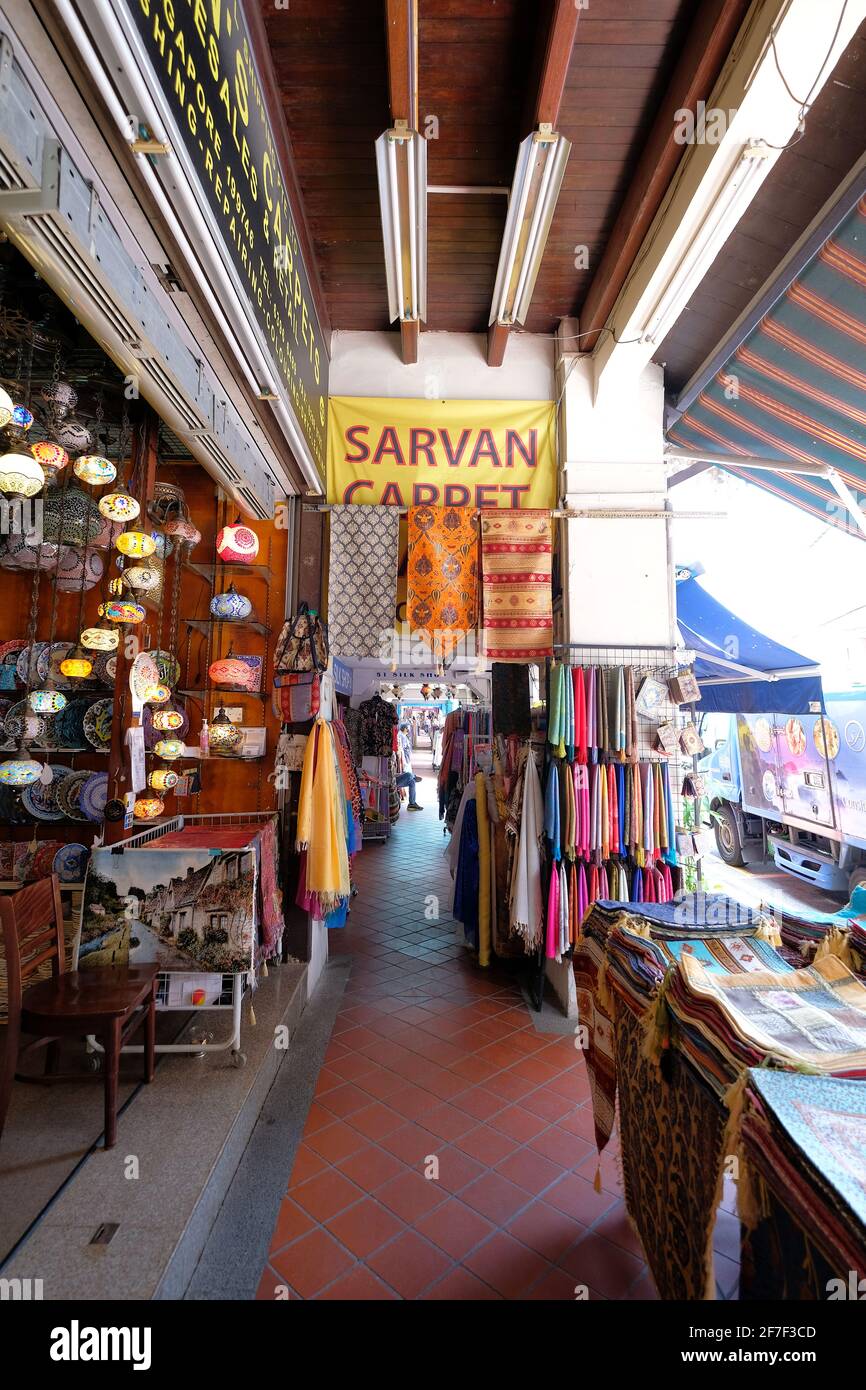 Colorful 'five-foot way' passage along a row of conserved shophouses in ...