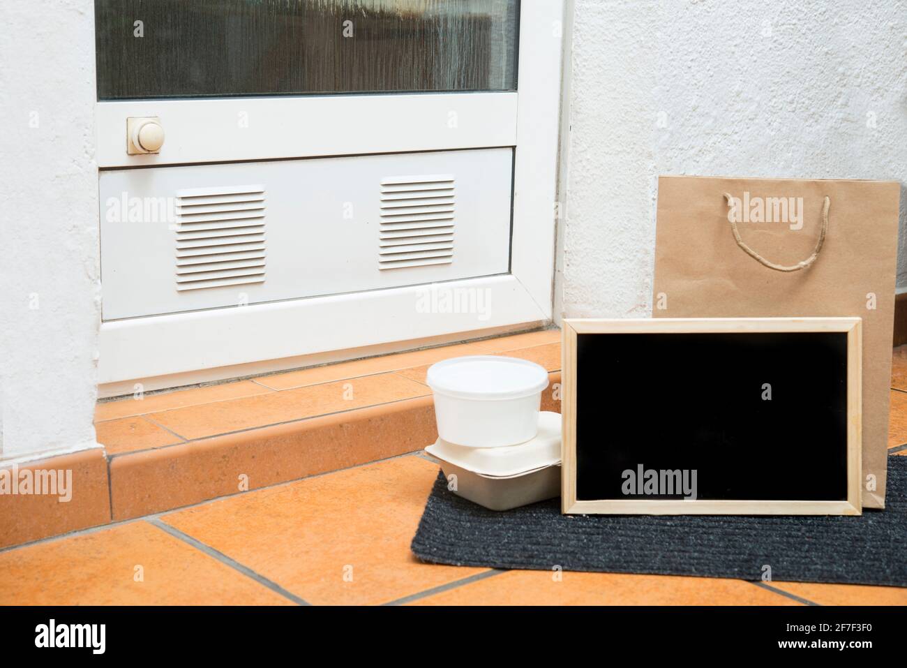 home delivery service, boxes standing by the house doors Stock Photo ...