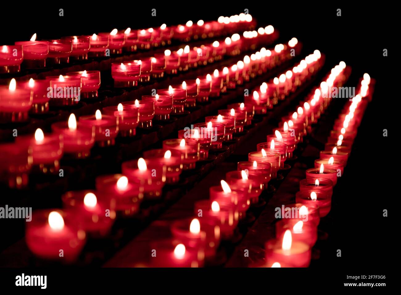 Group of red candles in church for faith resurrection prayer ...
