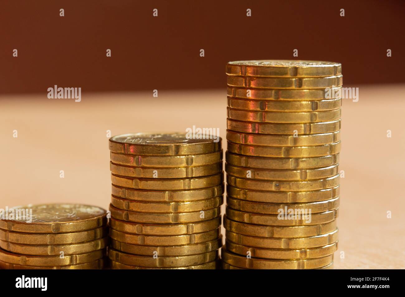 Close up view of three coin towers. Save money concept banner Stock ...