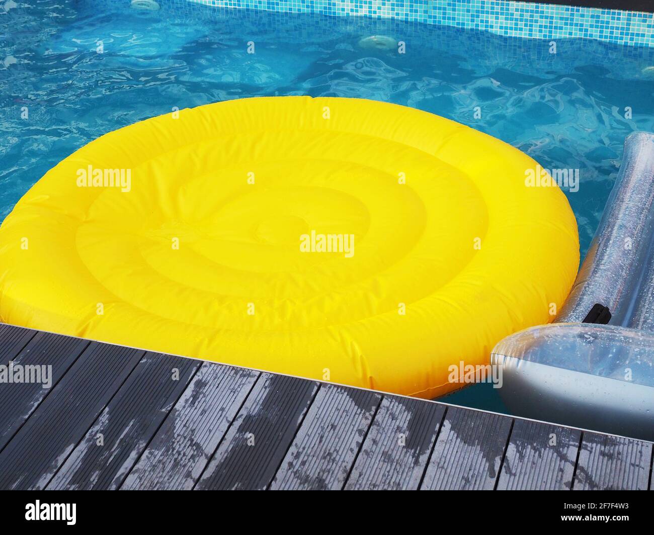 Yellow round inflatable mattress hi-res stock photography and images ...