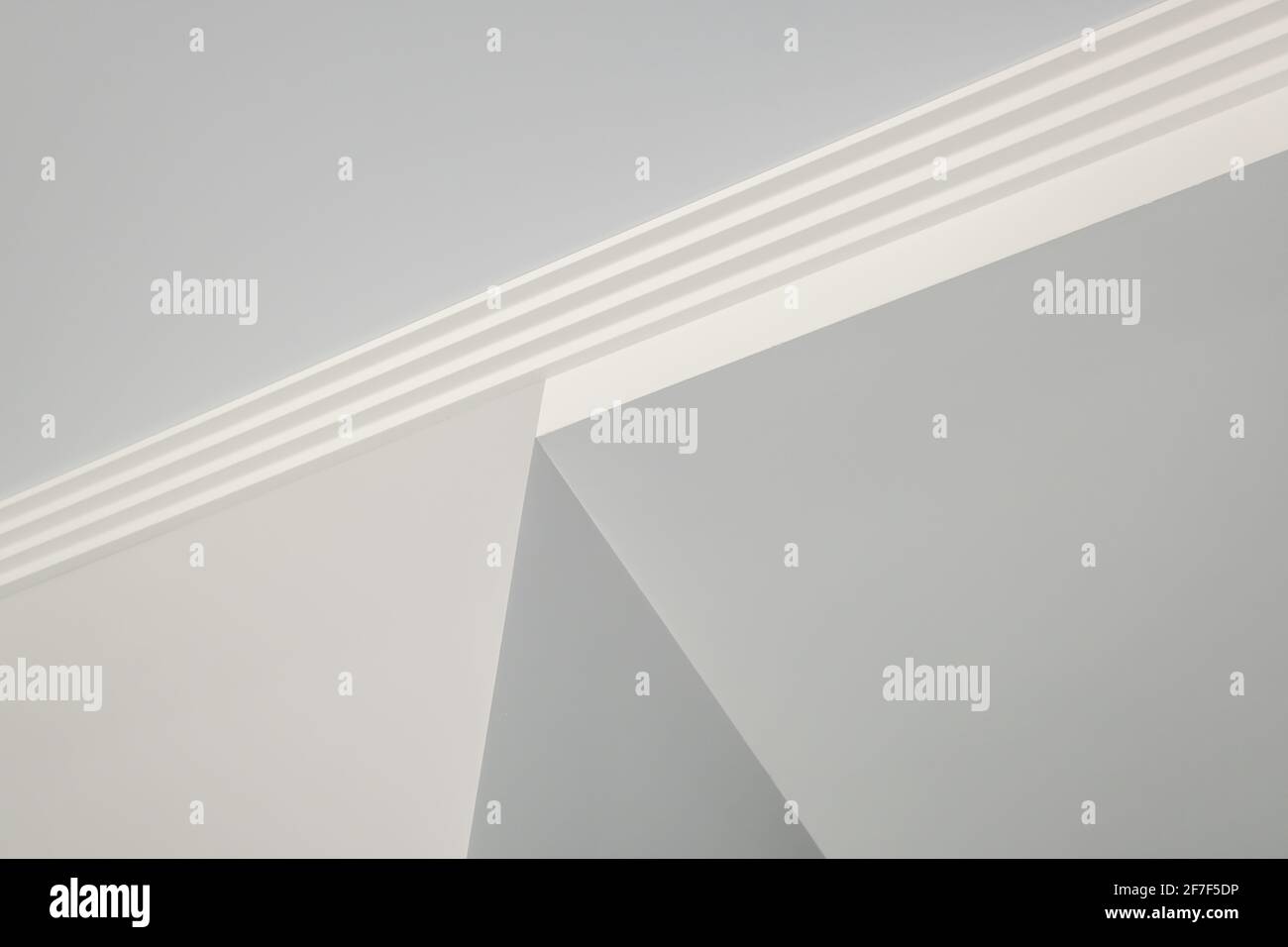 Detail of corner ceiling with intricate crown molding Stock Photo - Alamy