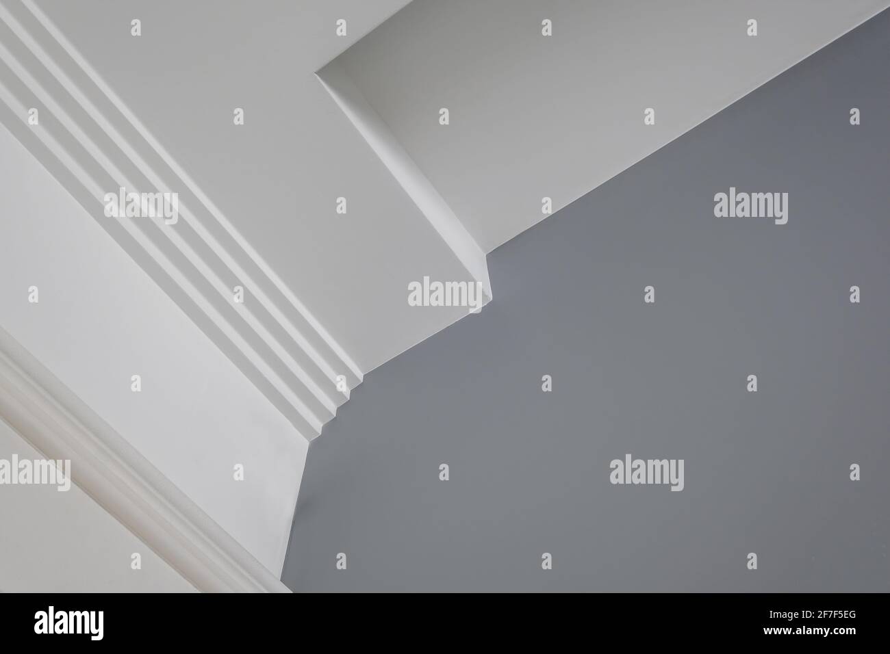 Detail of corner ceiling with intricate crown molding Stock Photo - Alamy