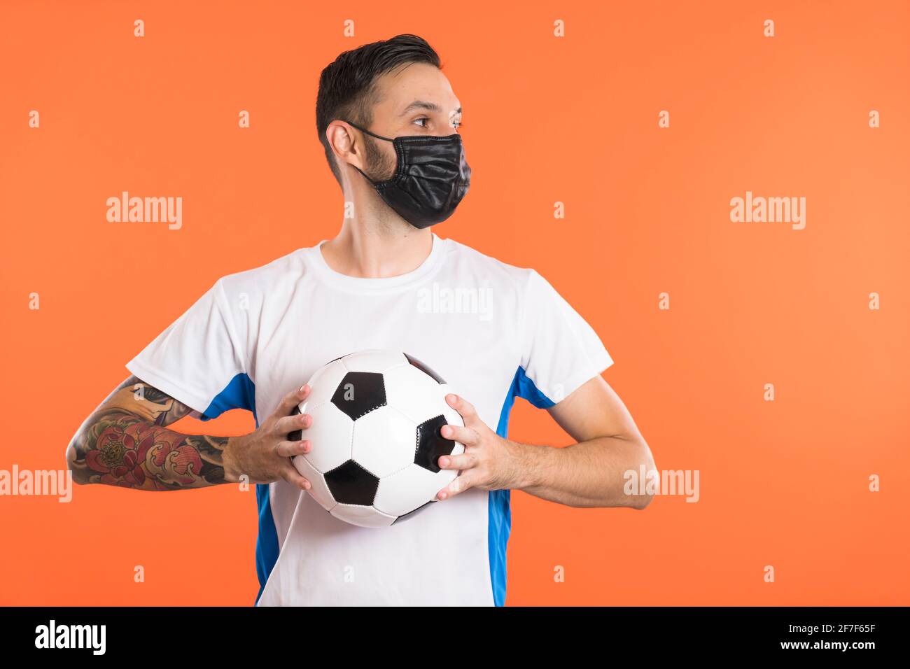 Young fan football mask hi-res stock photography and images - Alamy