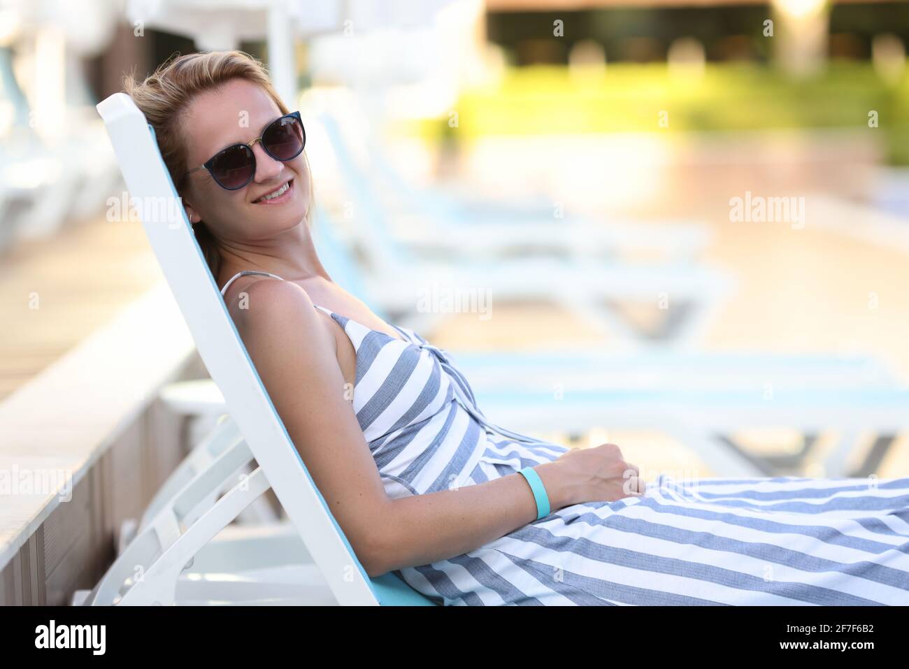 Lying on sunbed hi-res stock photography and images - Alamy
